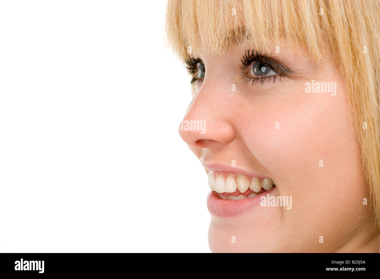 Head shot of woman smiling Stock Photo - Alamy