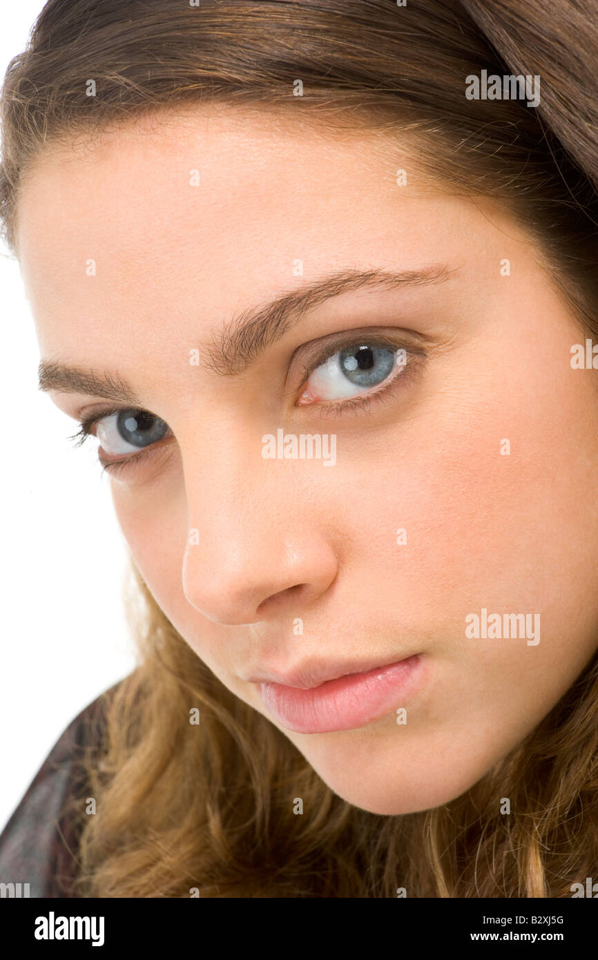 Head shot of woman thinking Stock Photo - Alamy