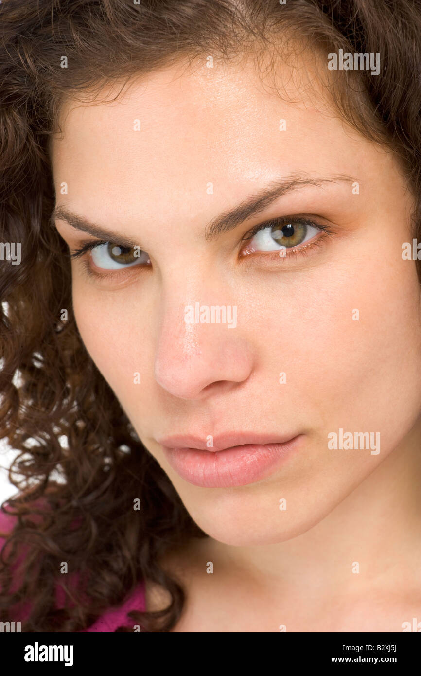 Head shot of woman thinking Stock Photo - Alamy