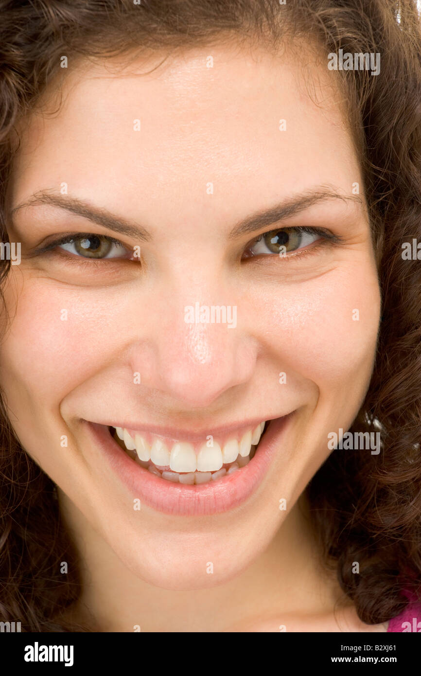 Head shot of woman smiling Stock Photo - Alamy