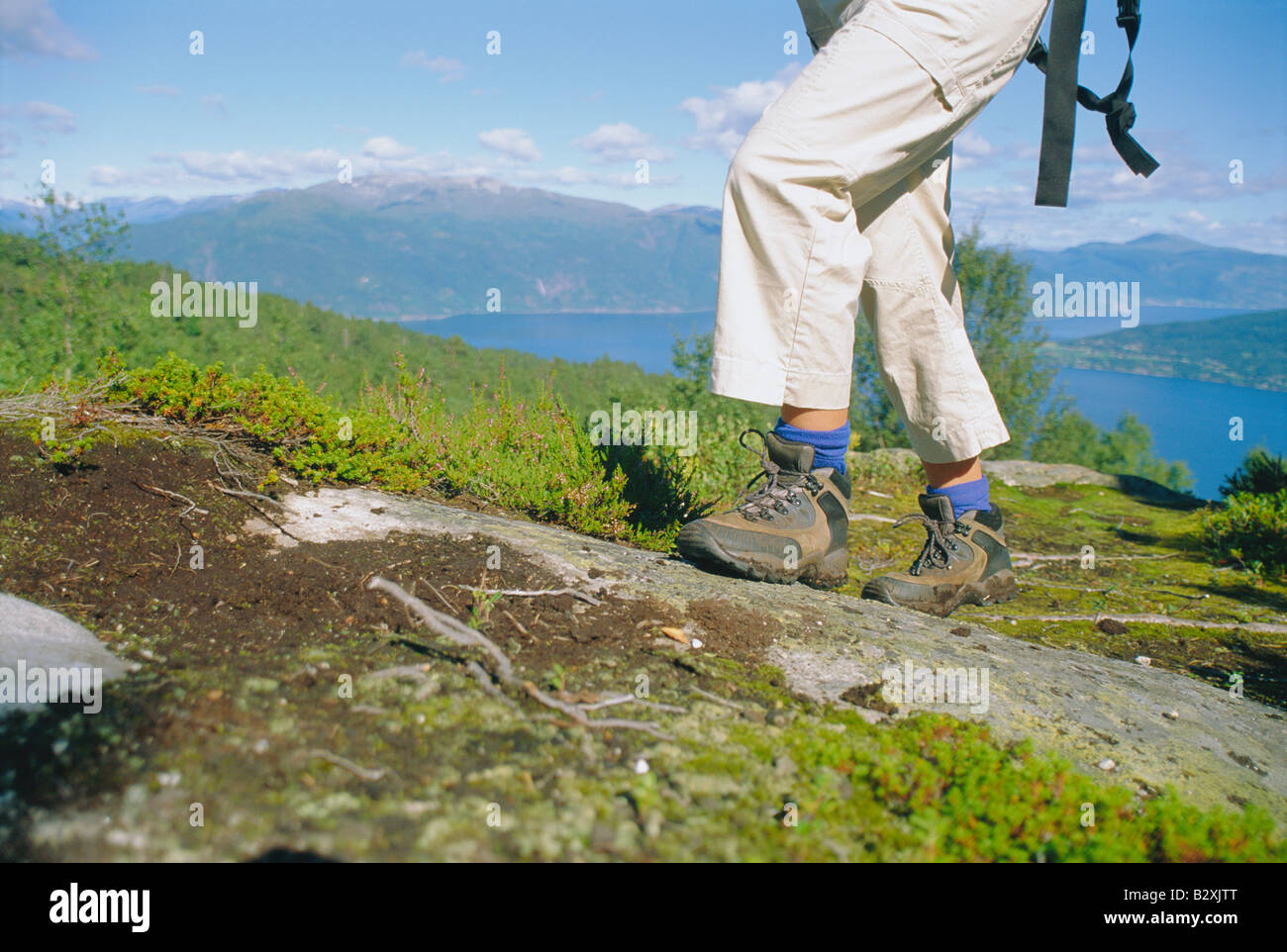 Woman's legs hiking outdoors in scenic location Stock Photo - Alamy