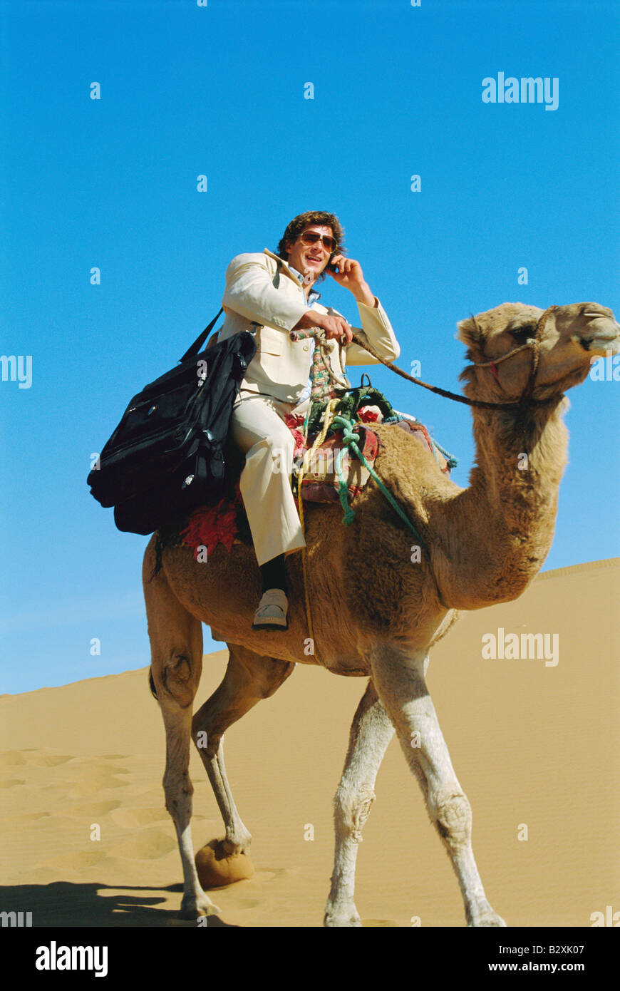 Camel man phone hi-res stock photography and images - Alamy
