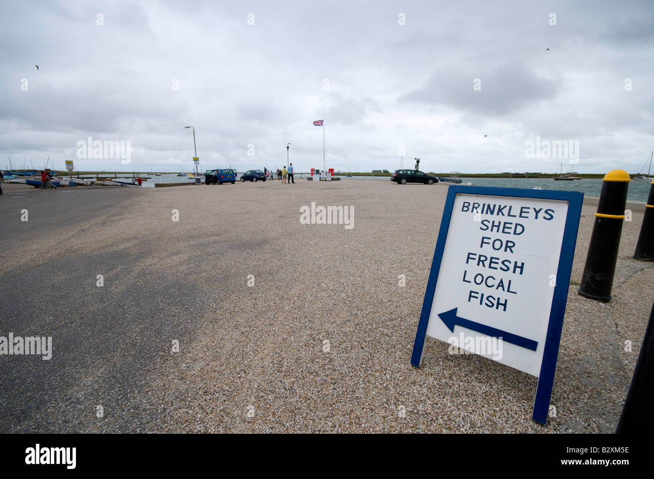 Directional sign board for fresh local fish Stock Photo - Alamy
