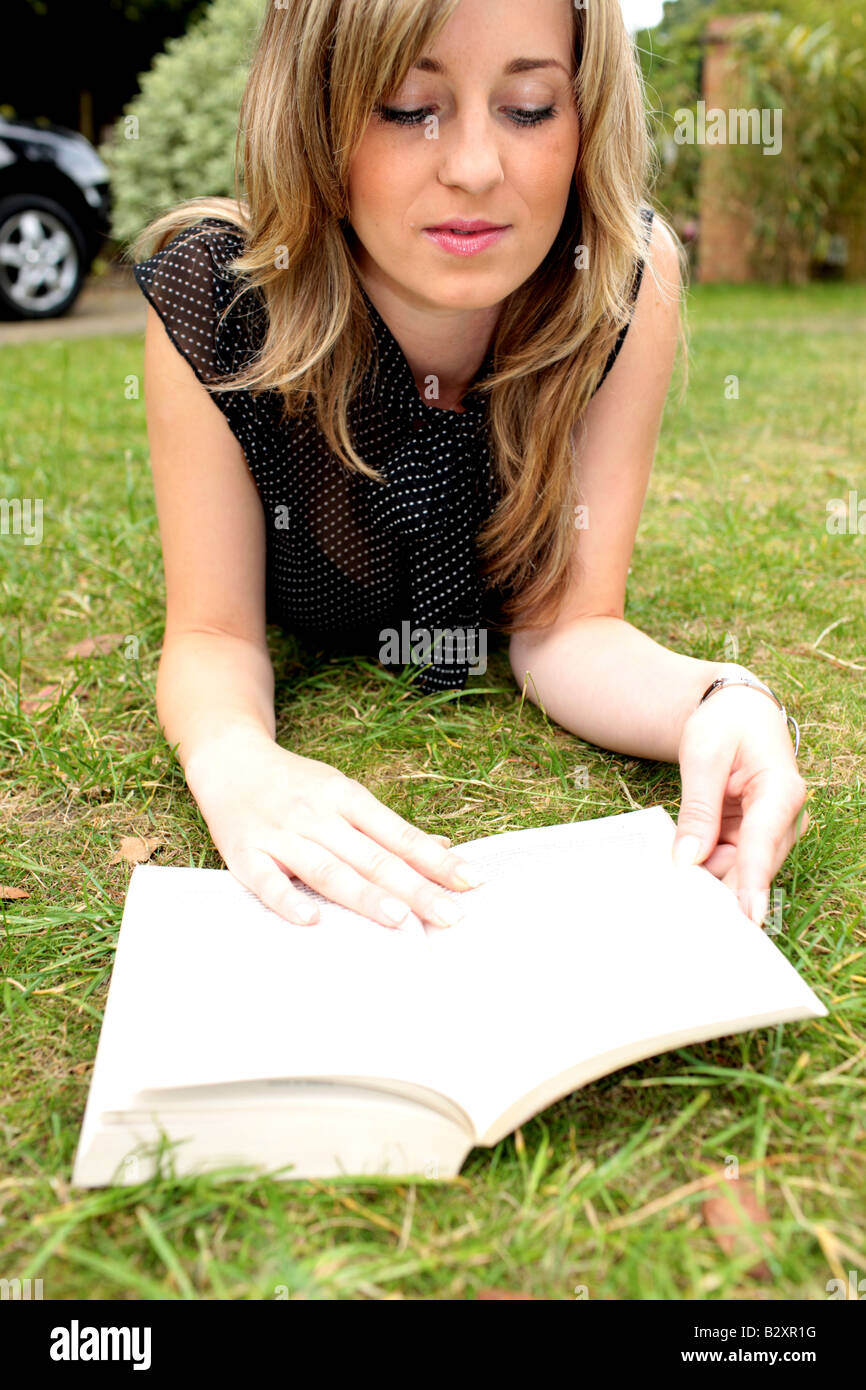 Young Woman Reading a Book Model Released Stock Photo - Alamy