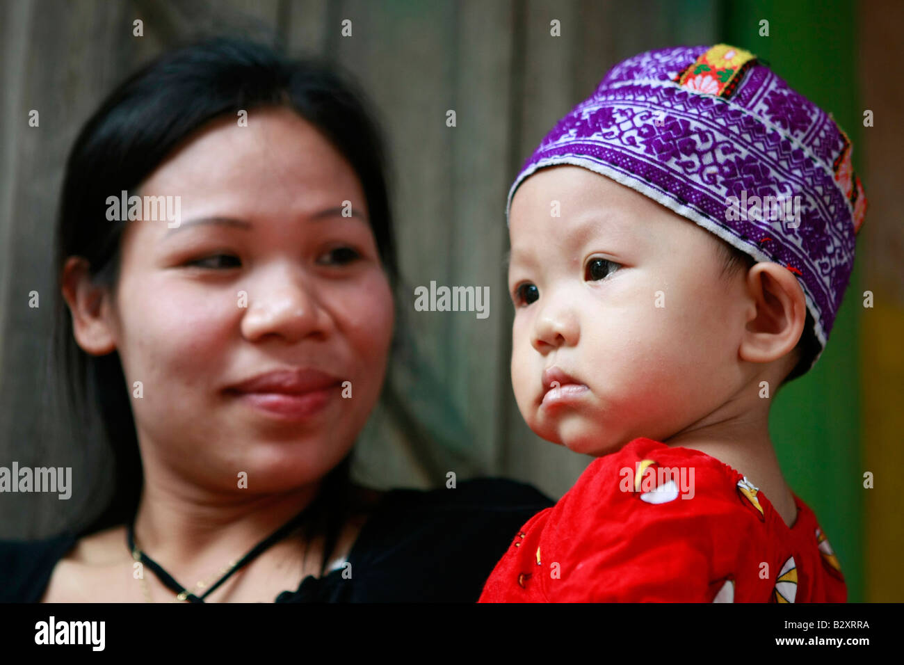 Vietnamese mother and child at a small village in the Red River valley ...