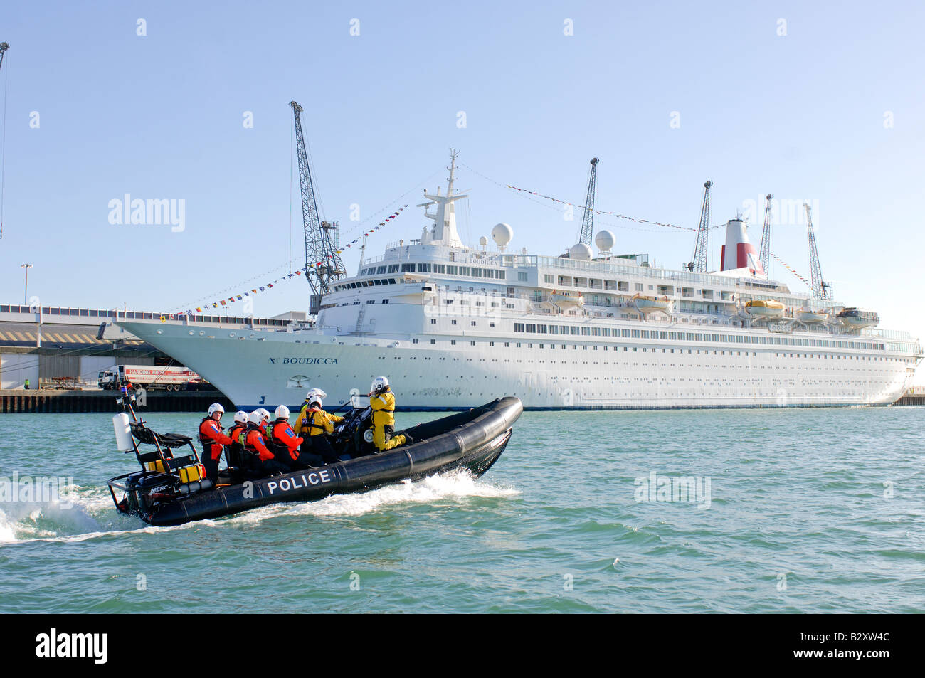 police using a halmatic rib boat to intercept a boat for investigation ...
