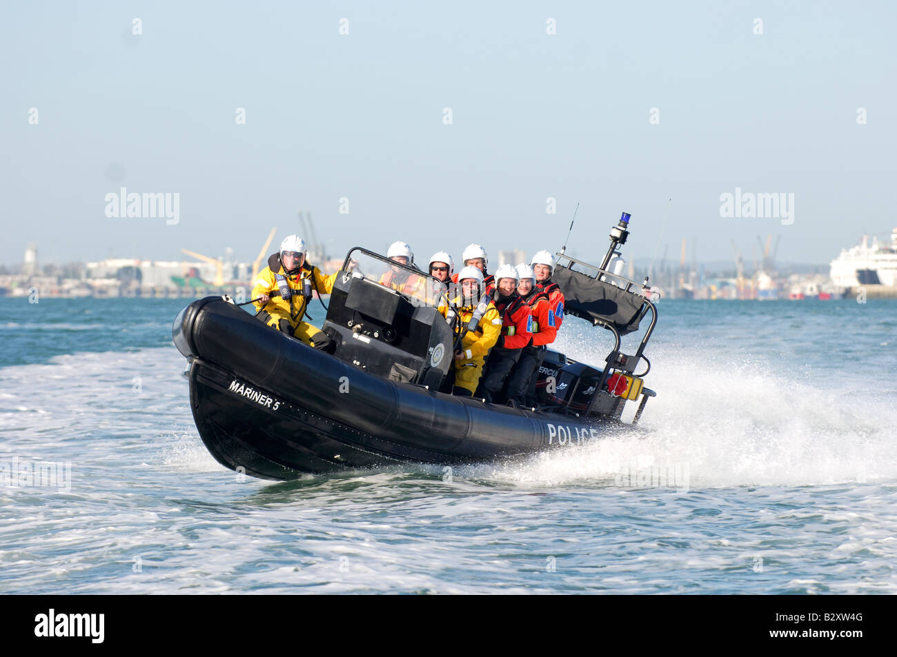police using a halmatic rib boat to intercept a boat for investigation ...