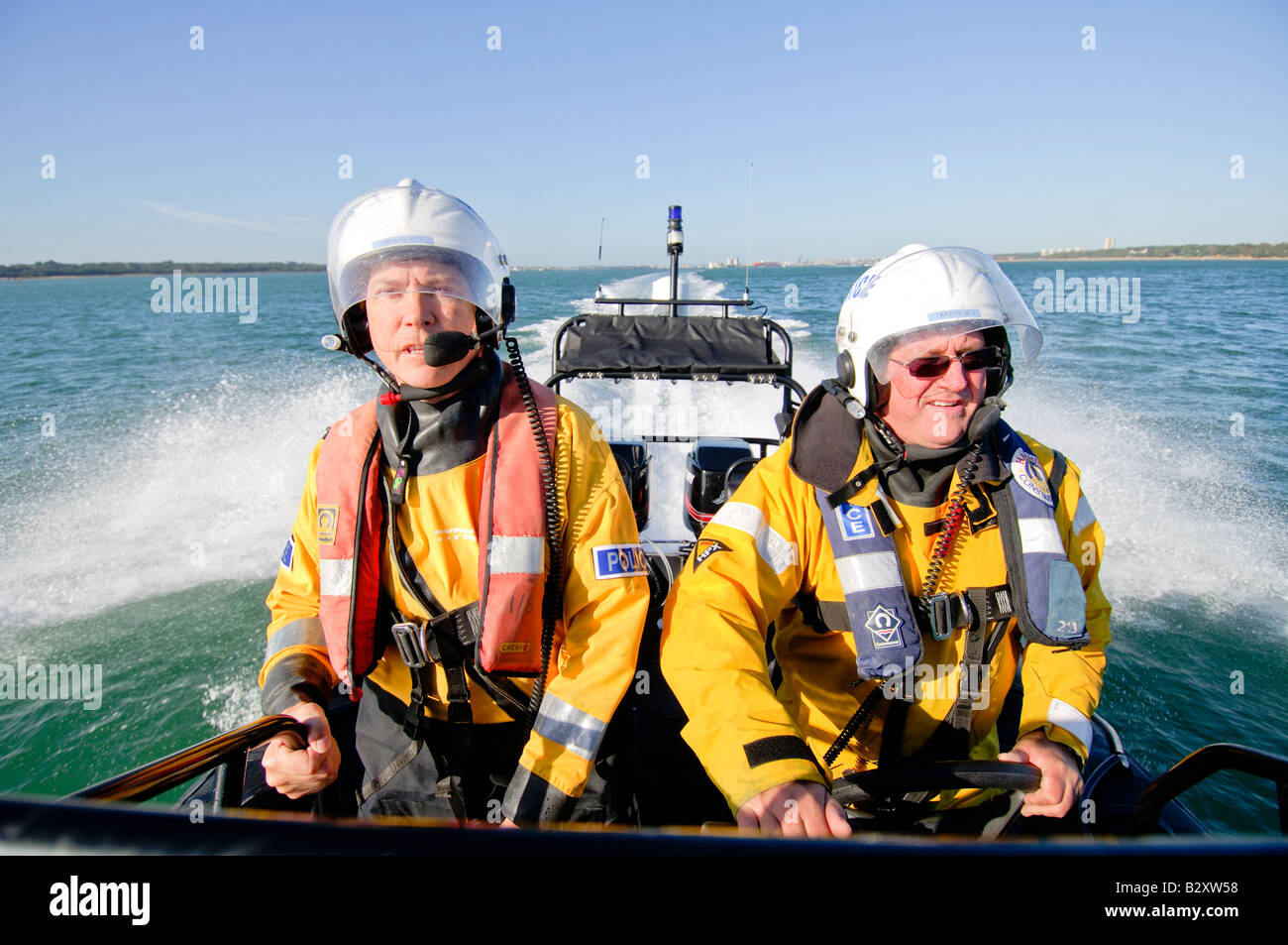 police using a halmatic rib boat to intercept a boat for investigation ...