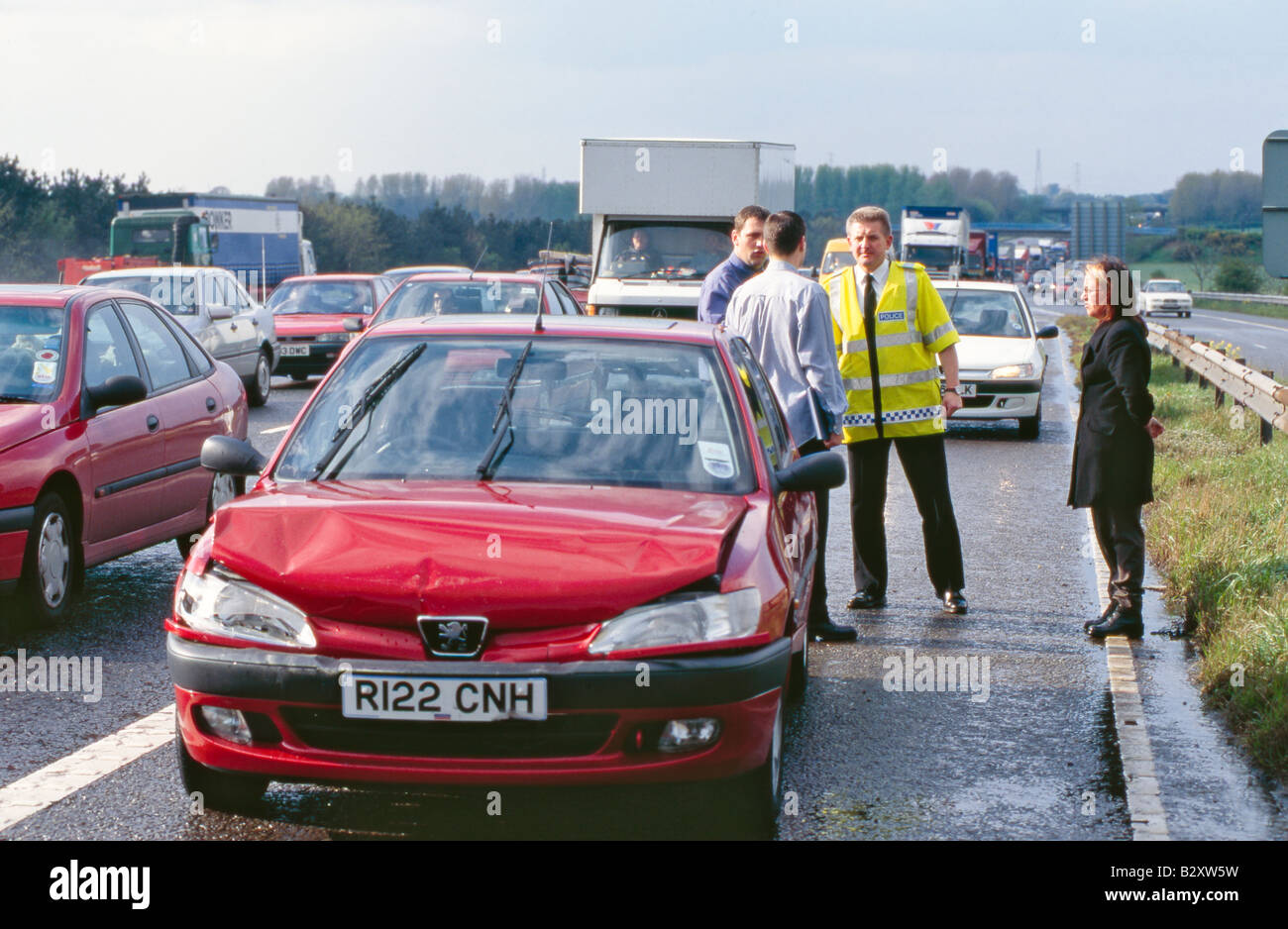 Police attending a minor traffic accident on a British motorway Stock ...