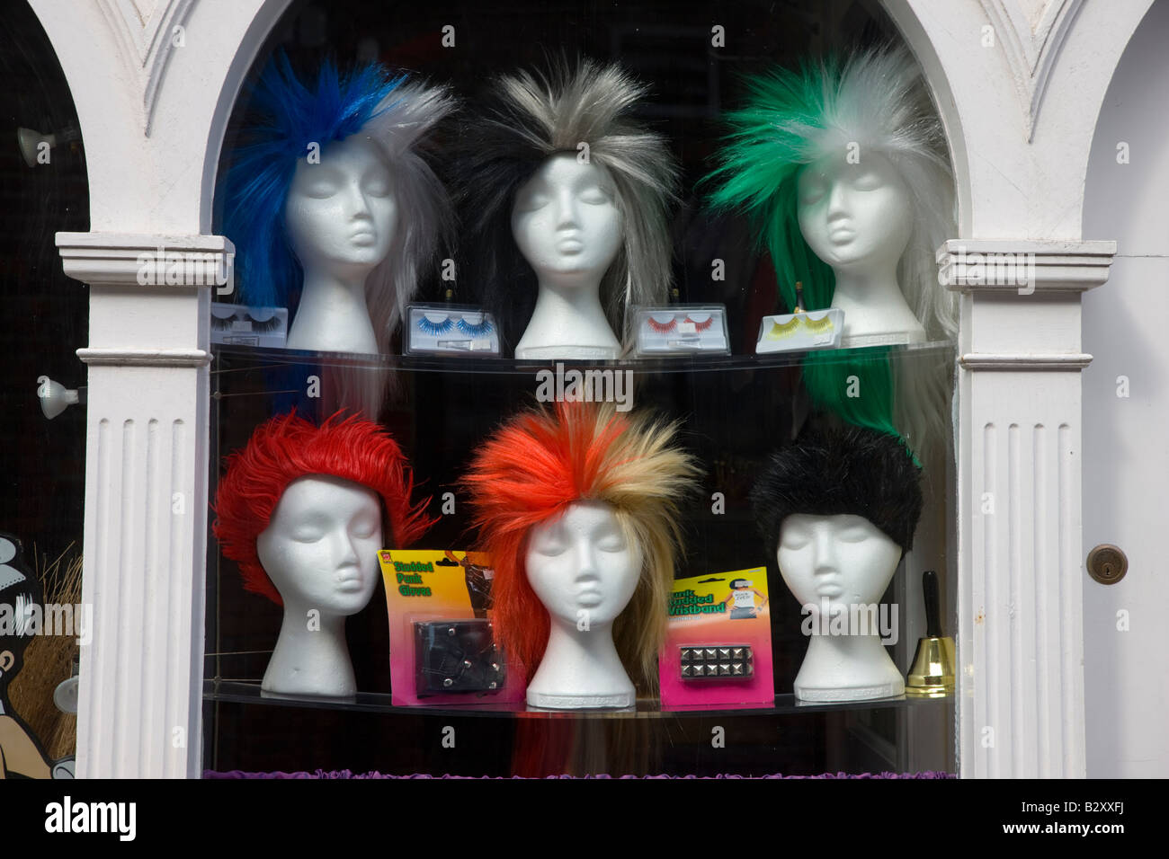 Fancy dress shop with punk wigs and accessories Stock Photo - Alamy