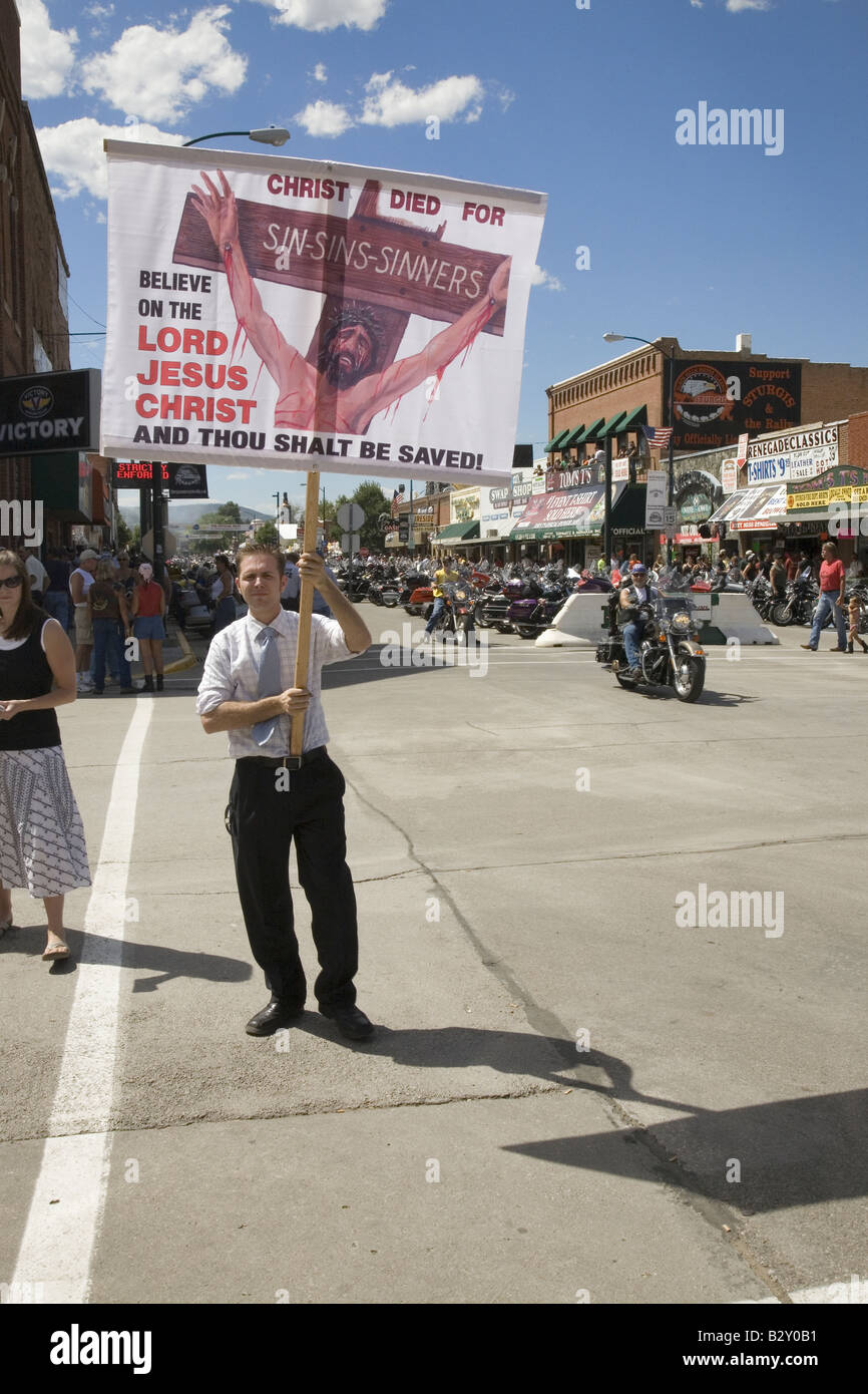 Christian carrying sign for Jesus down Main Street at the 67th Annual ...