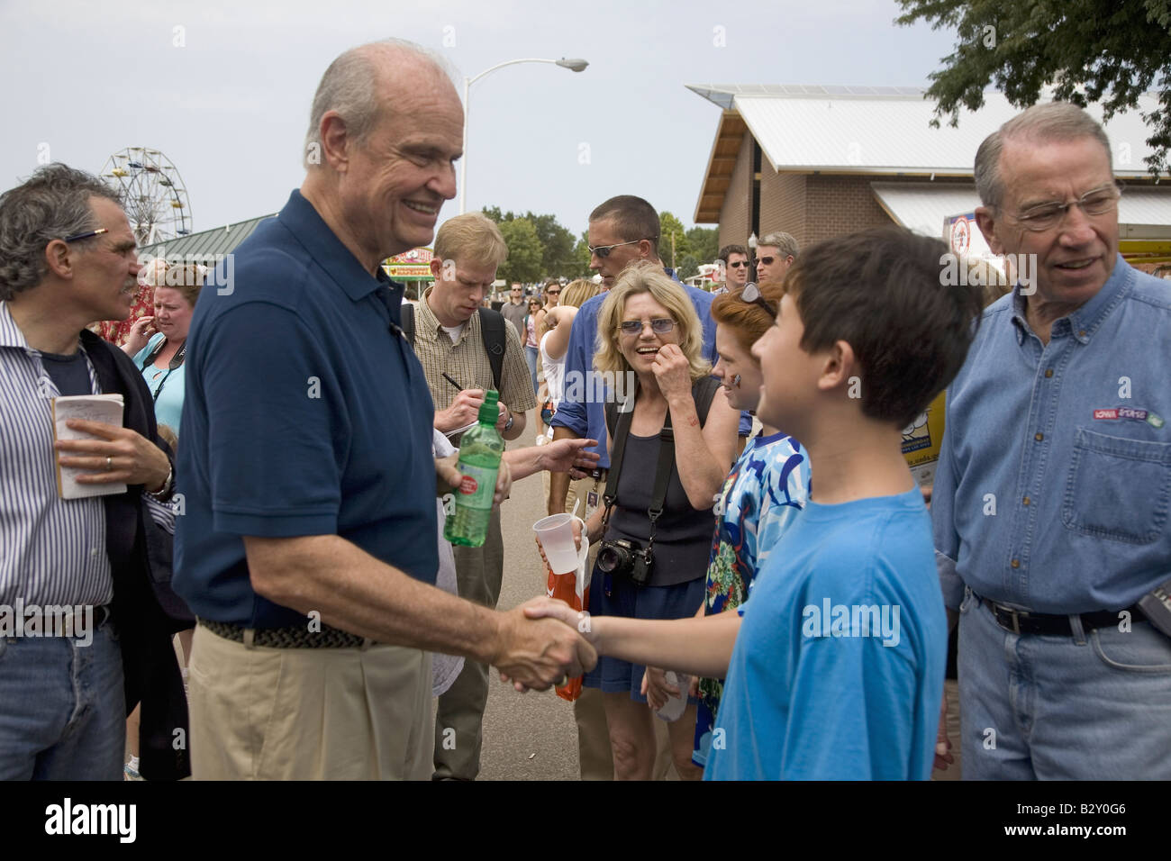Fred Thompson shaking boys hand and U.S. Senator from Iowa, Republican ...