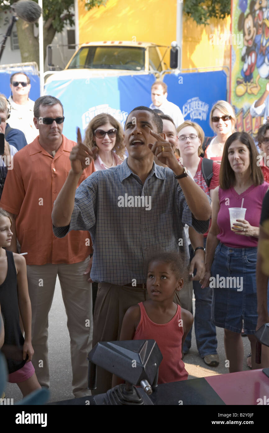 U.S. Senator Barak Obama campaigning for President with his daughter at ...