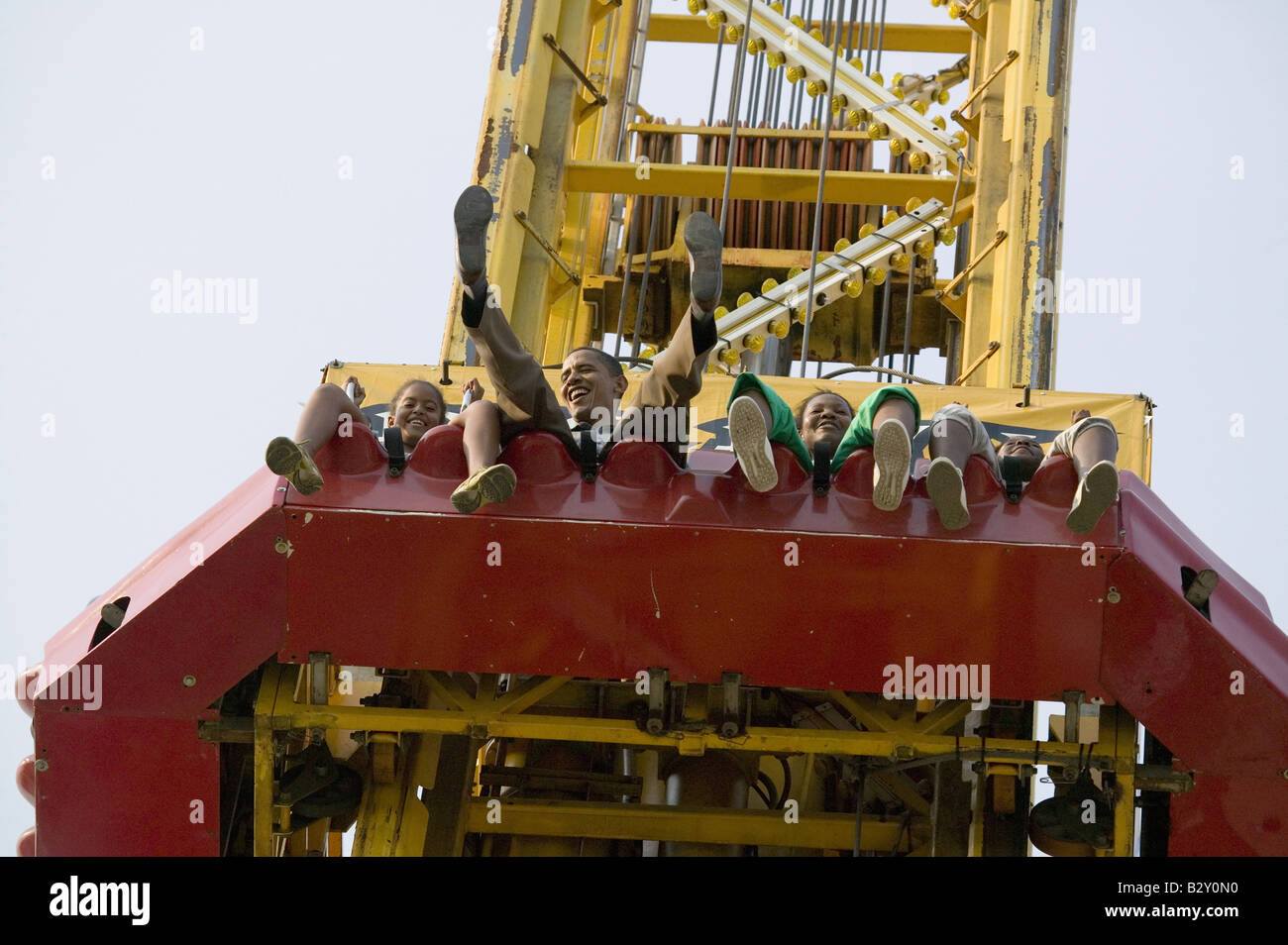 U.S. Senator Barak Obama taking ride on "Big Ben" with his daughters at ...