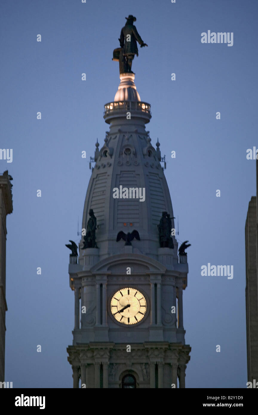 William Penn statue and clock on the top of City Hall at dusk from ...