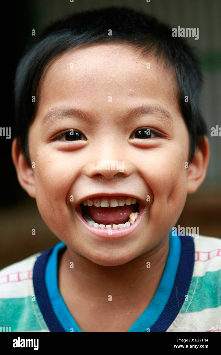 Vietnamese boy at a small village in the Red River valley, north ...
