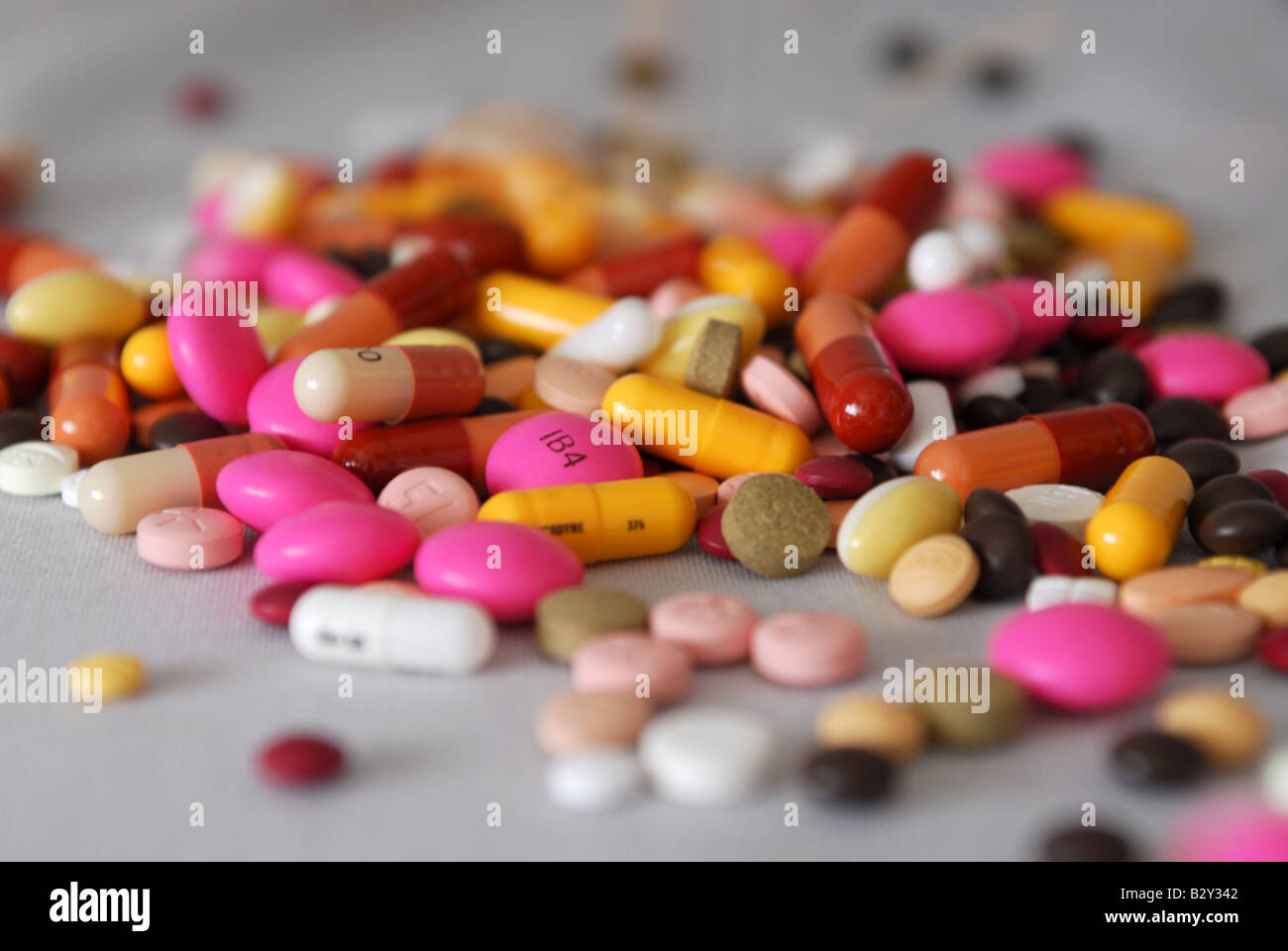 generic of a pile of tablets and pills Stock Photo - Alamy