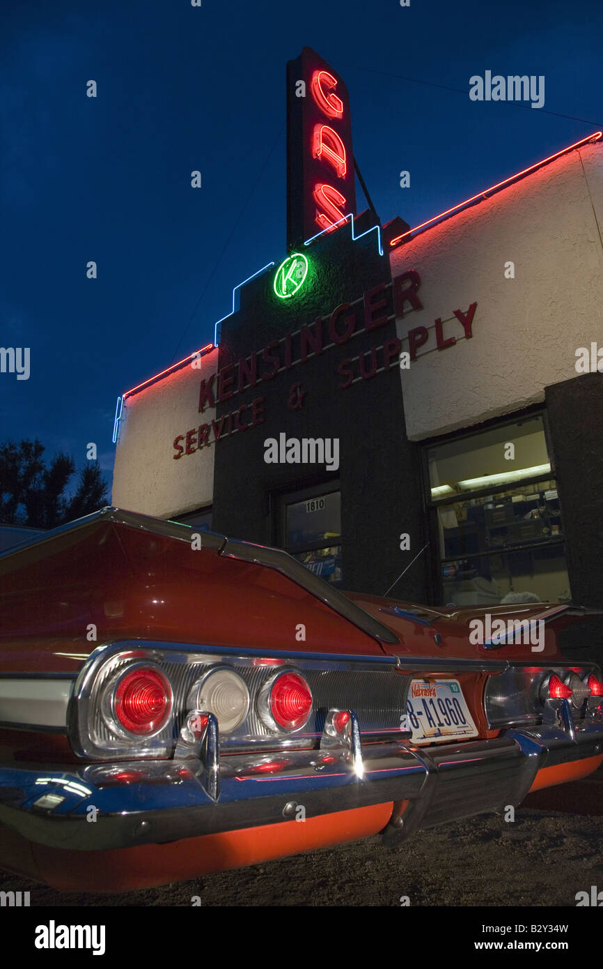 Neon sign reading "Gas" and 1960 red Impala Chevrolet at Kensinger ...