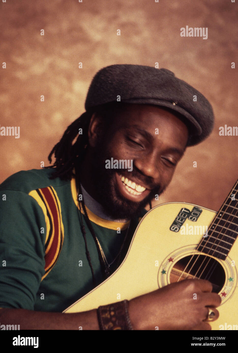 Male Model African American Musician plays Guitar Stock Photo - Alamy