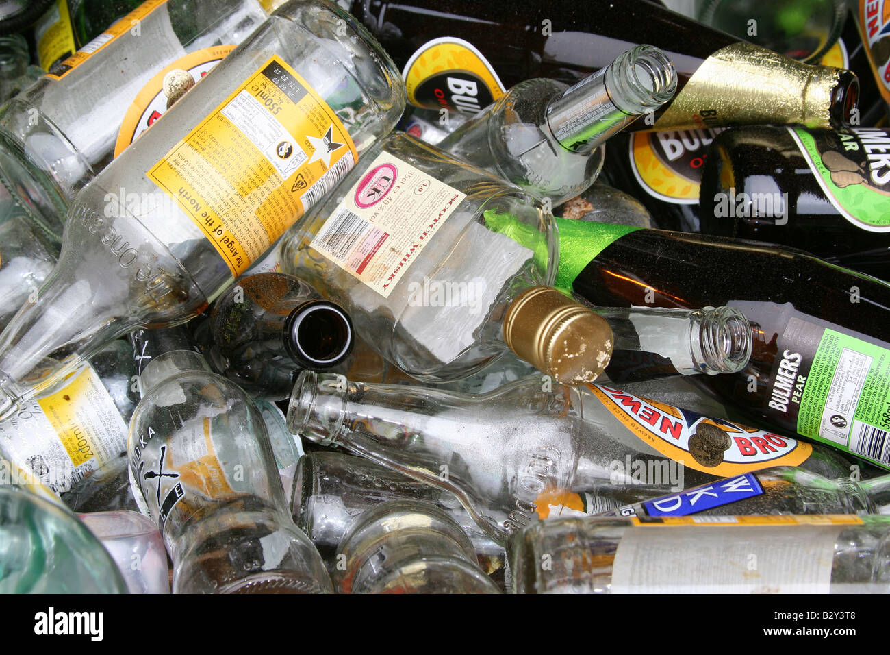 Broken and intact empty bottles in a skip outside a public house Stock ...