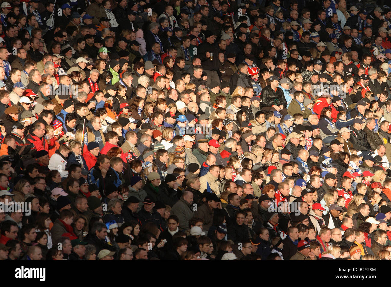 Spectators in the stands during football game Stock Photo - Alamy