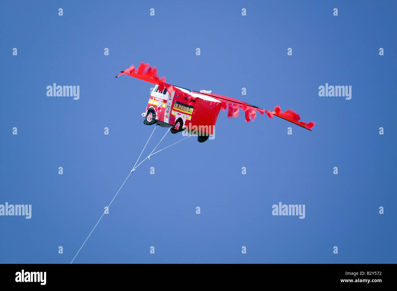 A truck-shaped kite flying in a deep blue sky on April 15, 2007, at the ...