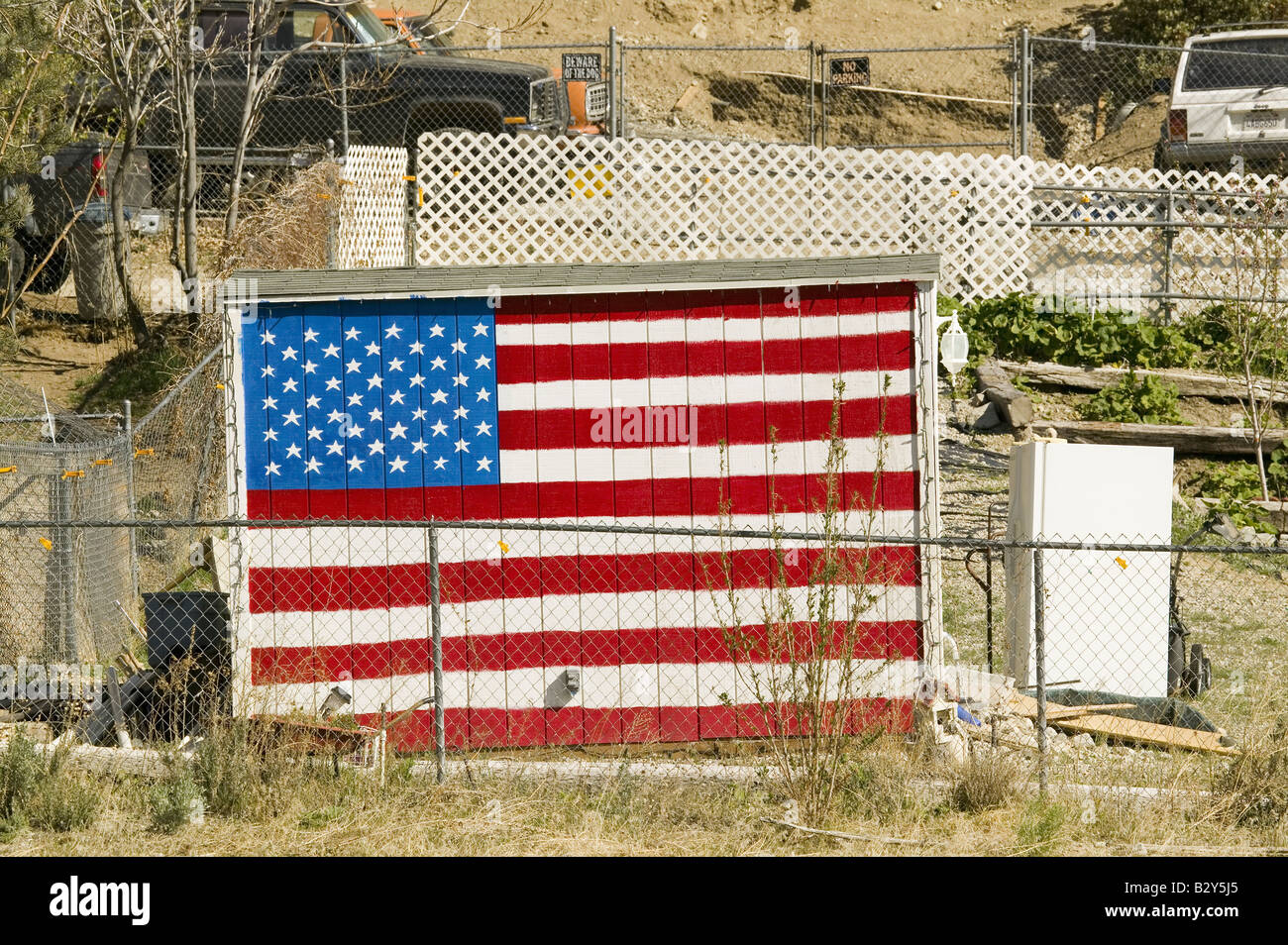 A large American flag painted on the backside of a garage in Frazier ...