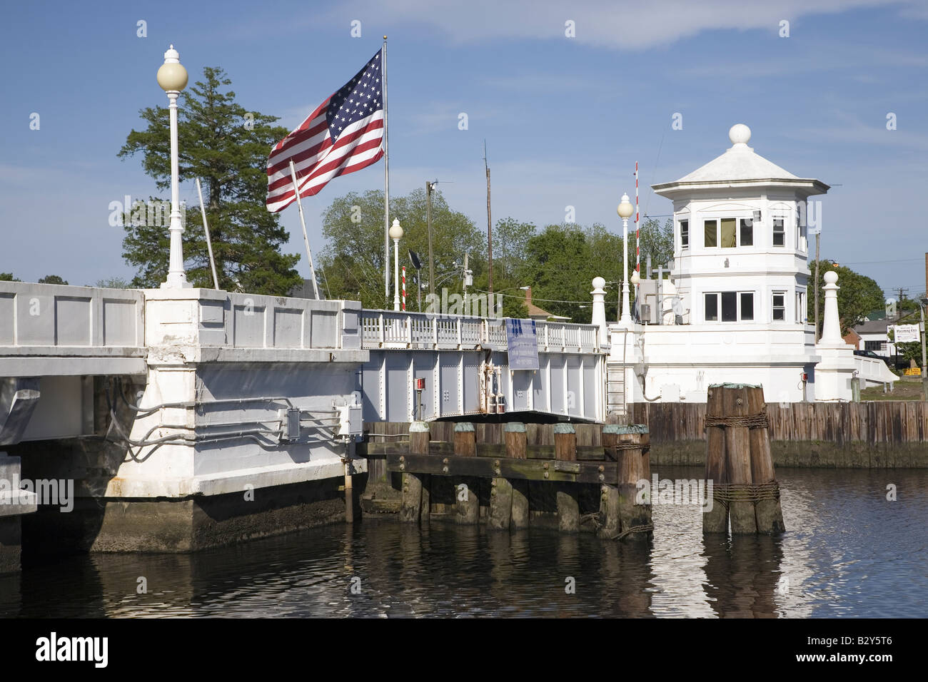 American Flag flying over white bridge in Pocomoke City, the Eastern ...