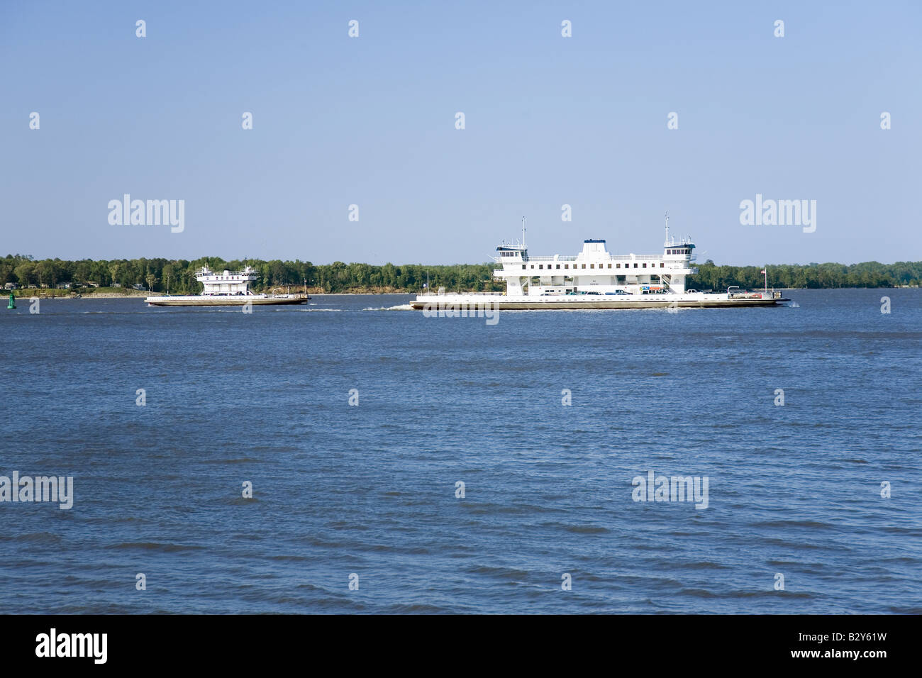 Two ferry boats with cars crossing James River from Jamestown Virginia ...
