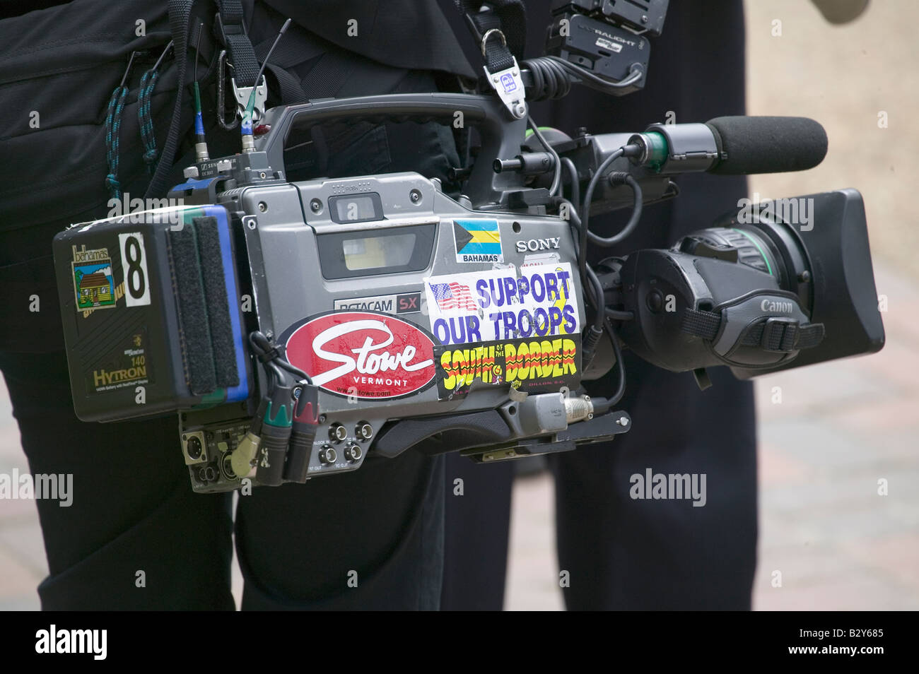 News video camera with sticker that reads "Support Our Troops ...