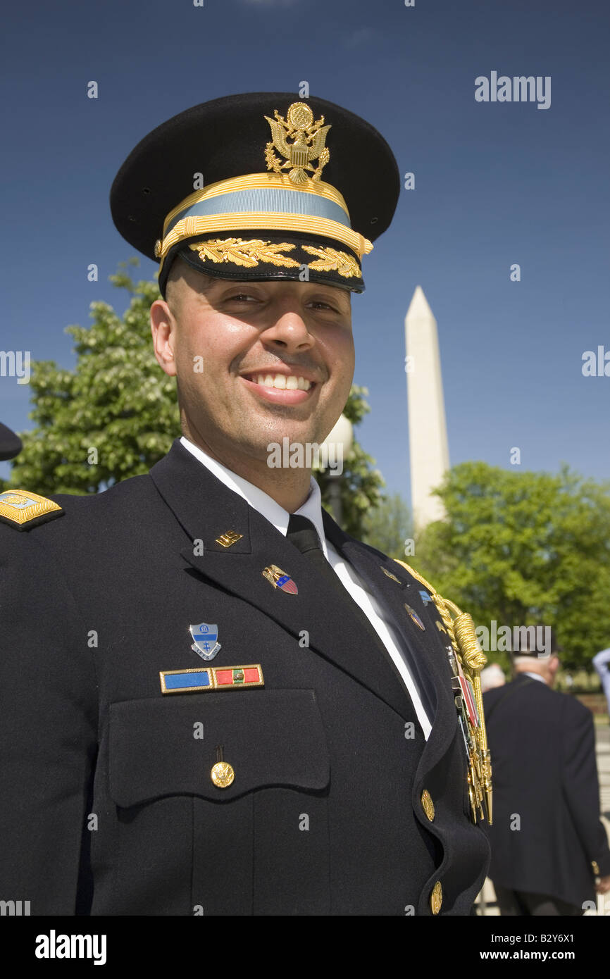 Military officer in full dress uniform posing in front of National ...