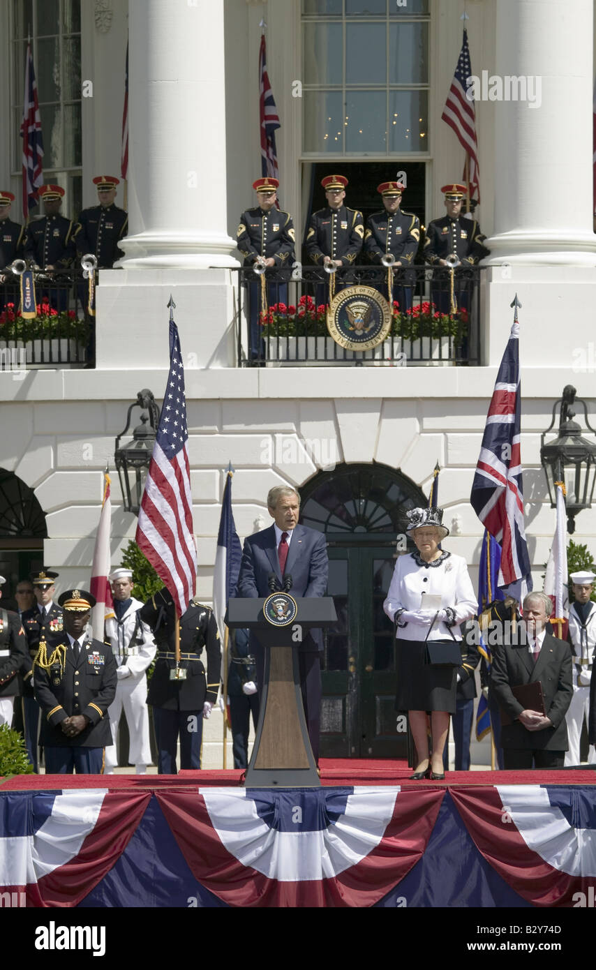 President George W. Bush speaking with Queen Elizabeth II standing to ...