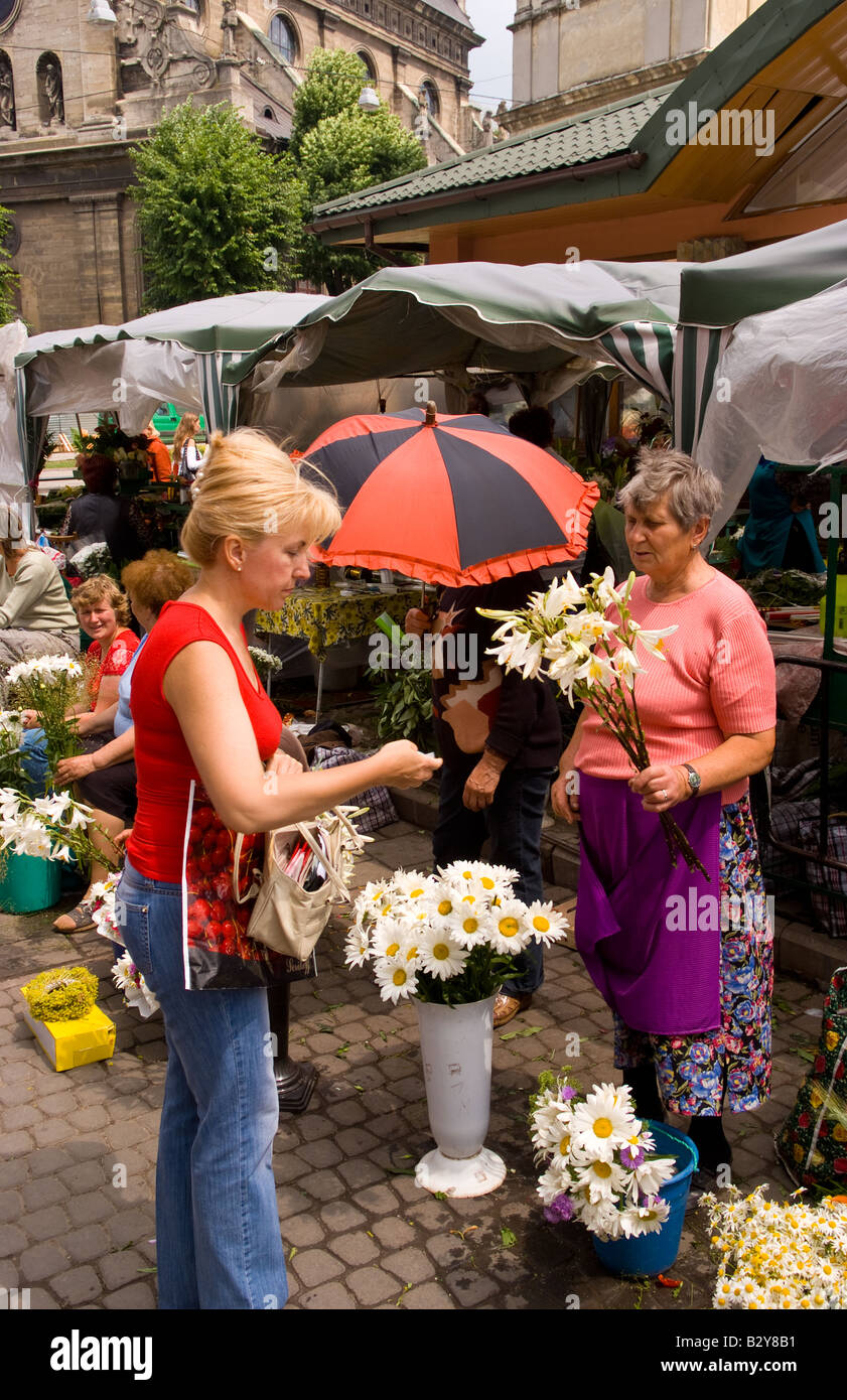 Lady selling flowers old town hi-res stock photography and images - Alamy