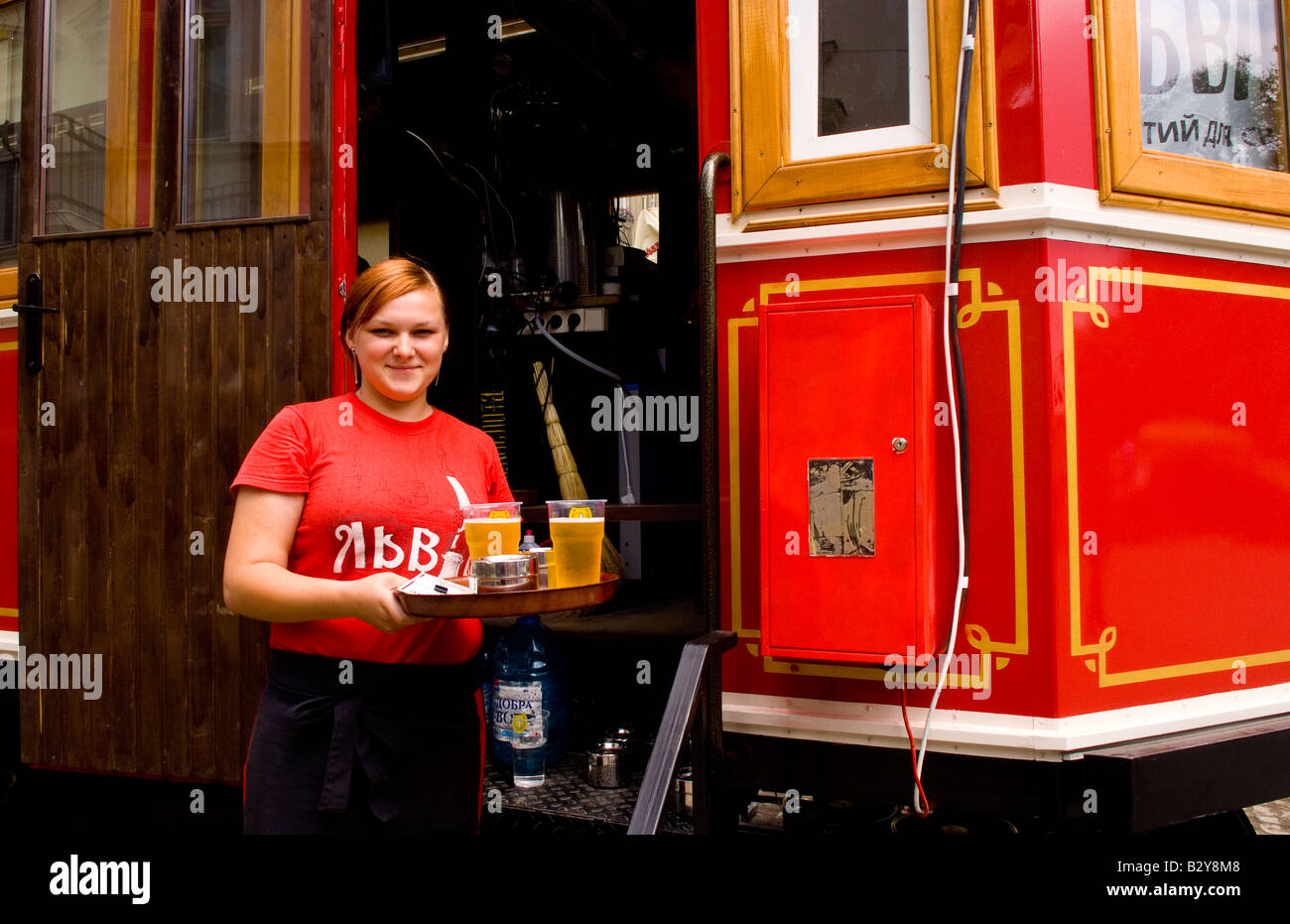Waitress beer in front old train restaurant in hi-res stock photography ...