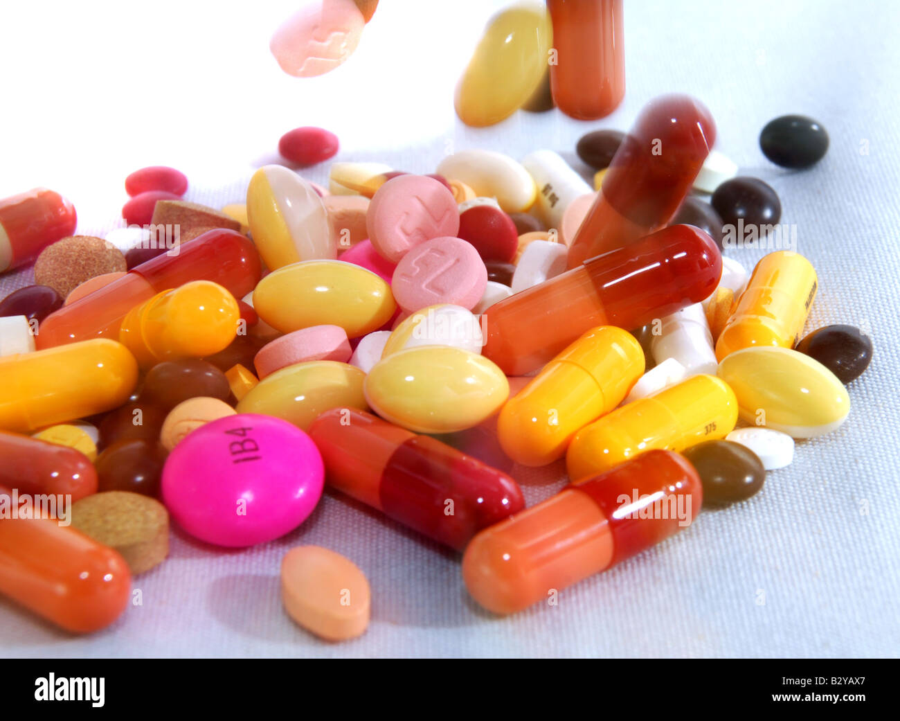 generic of a pile of tablets and pills Stock Photo - Alamy