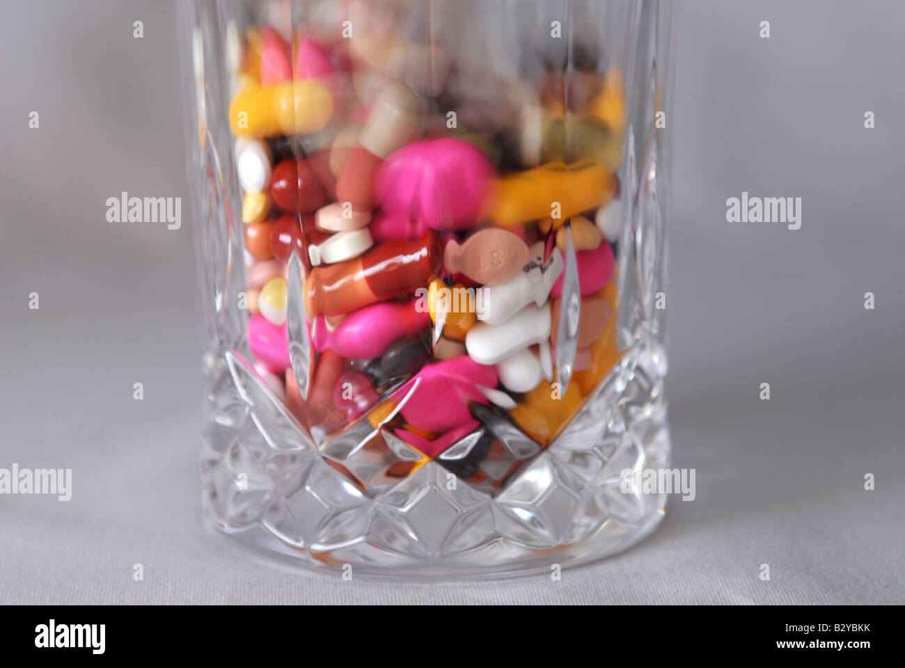 generic image of a glass of tablets Stock Photo - Alamy
