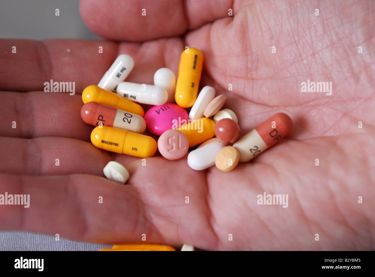 Handful of tablets hi-res stock photography and images - Alamy