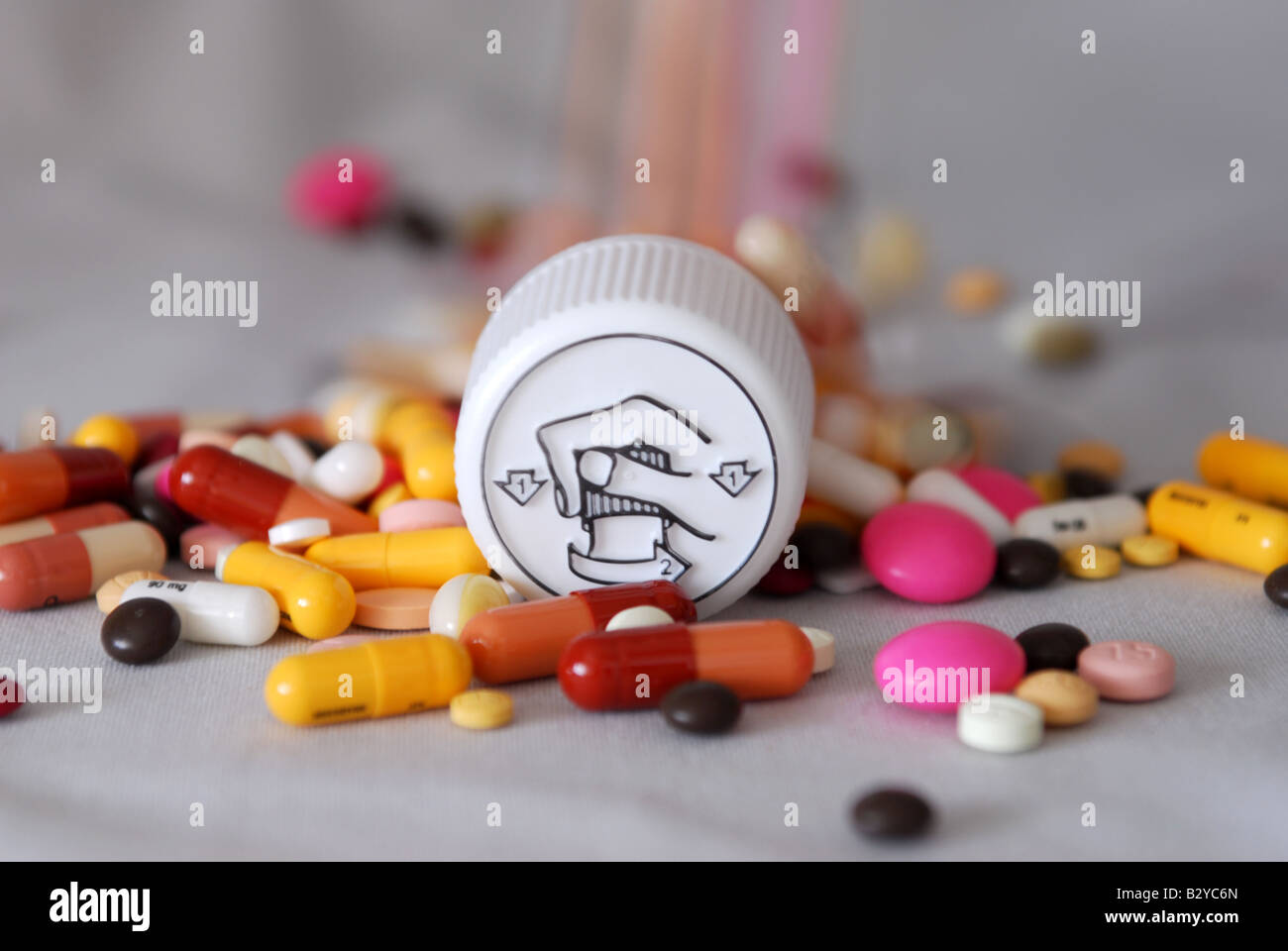 generic image of a falling tablets and a plastic bottle screw cap Stock ...