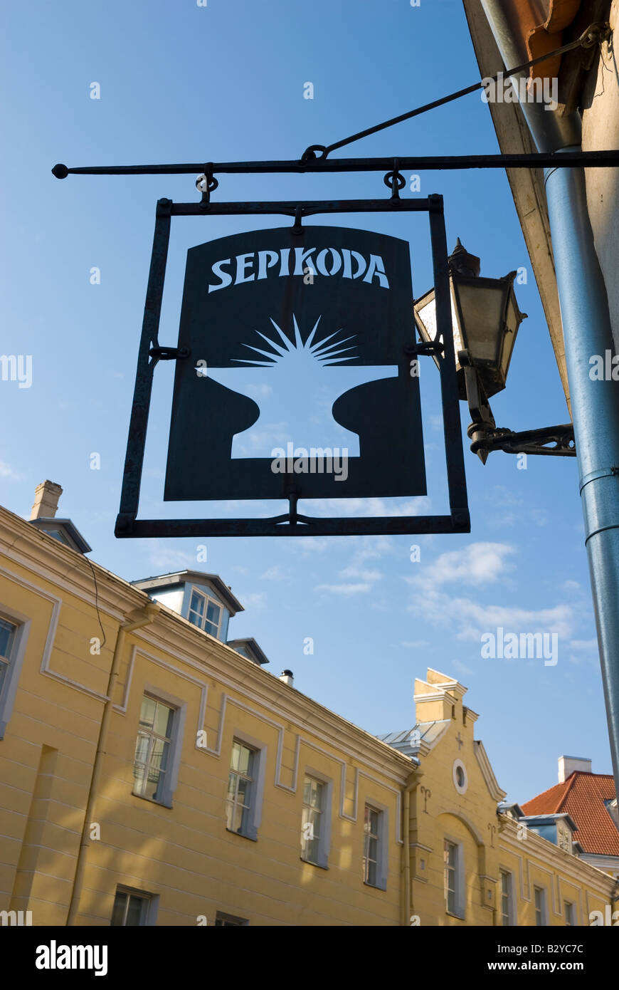Blacksmith's sign hanging outside a shop in the Old Town of Tallinn ...