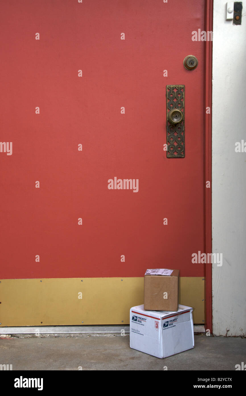 Parcels left at front door Stock Photo - Alamy