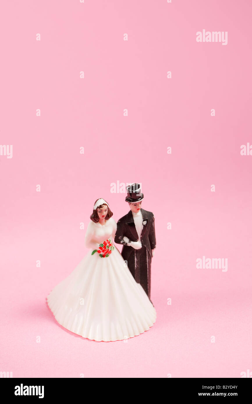 Vintage plastic wedding cake decoration Stock Photo - Alamy