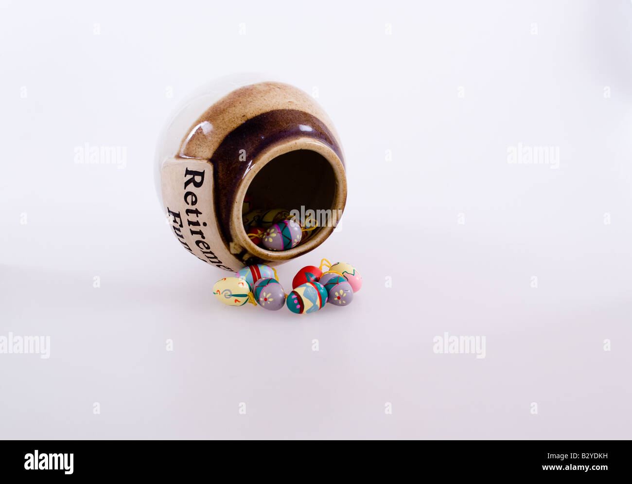 Retirement fund jar turned on it's side, with multiple types of candy ...