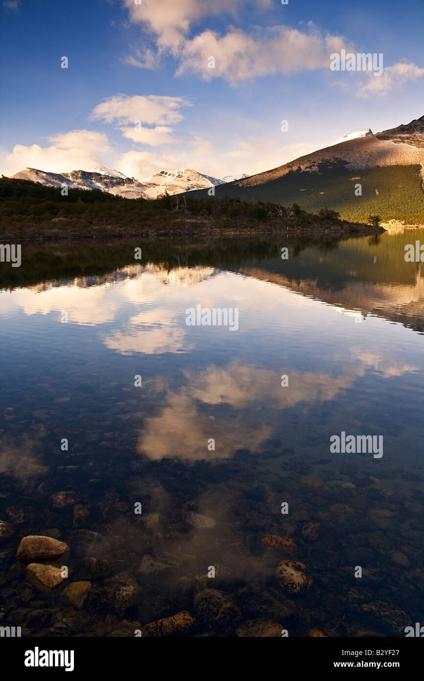 Reflections in the perfect calm waters of Lake Capri Stock Photo - Alamy
