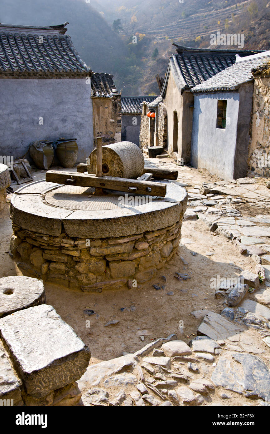 CHINA Chuandixia Ancient stone grindstone and cheerful red lanterns in ...