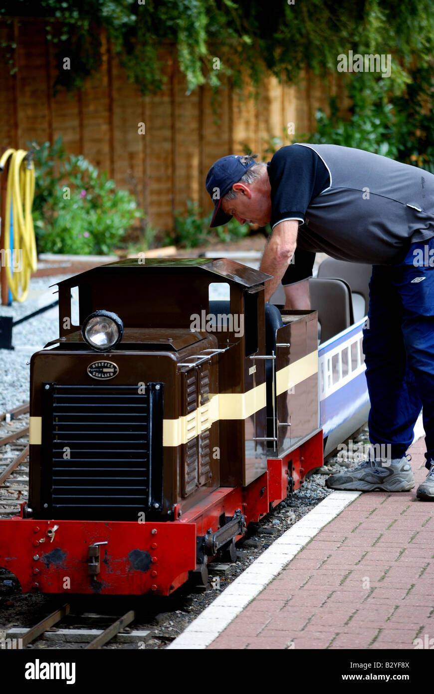 Men and thier toys Stock Photo - Alamy