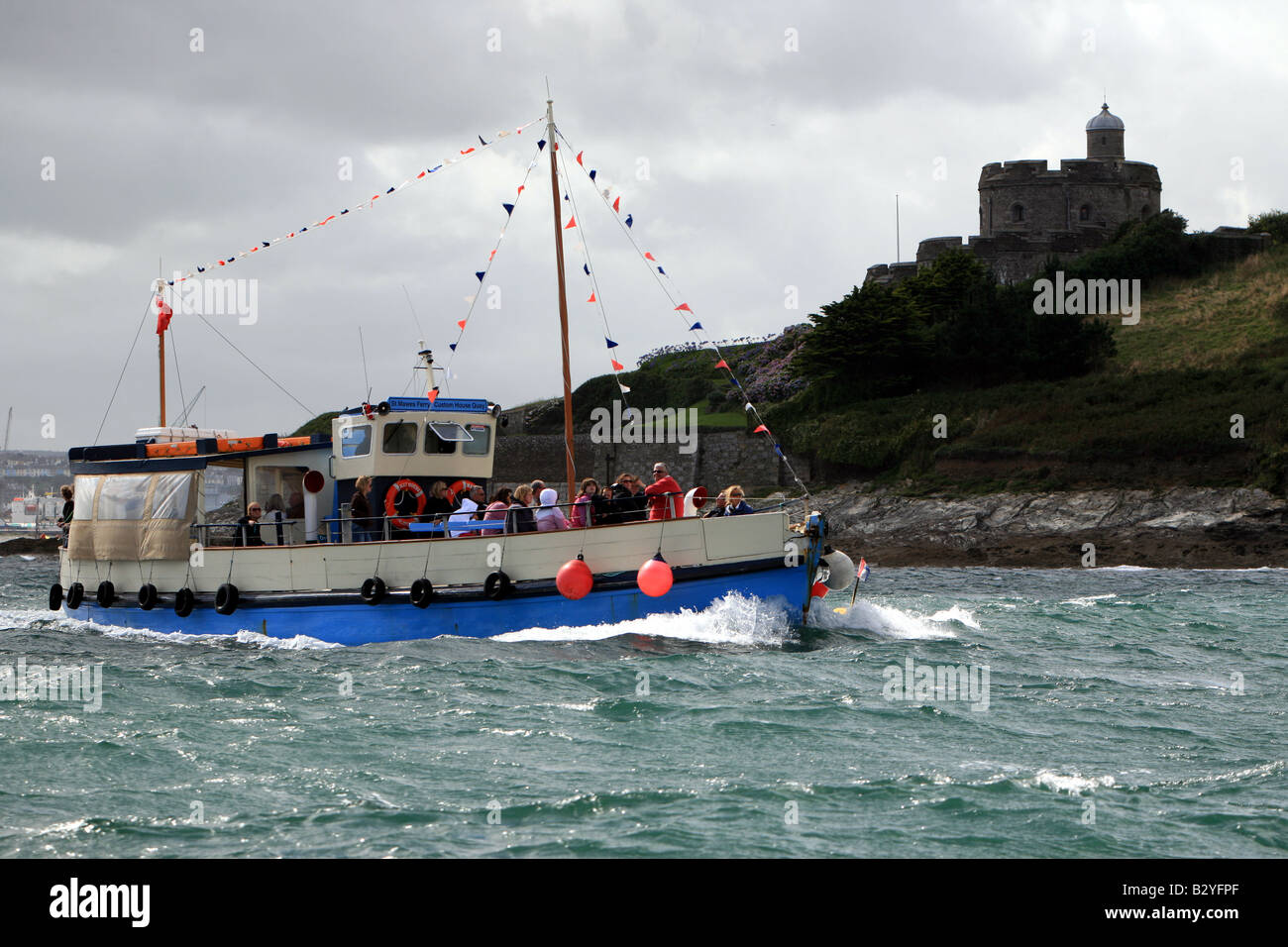 The ferry from Falmouth coming in to the Percuil river passing St Mawes ...