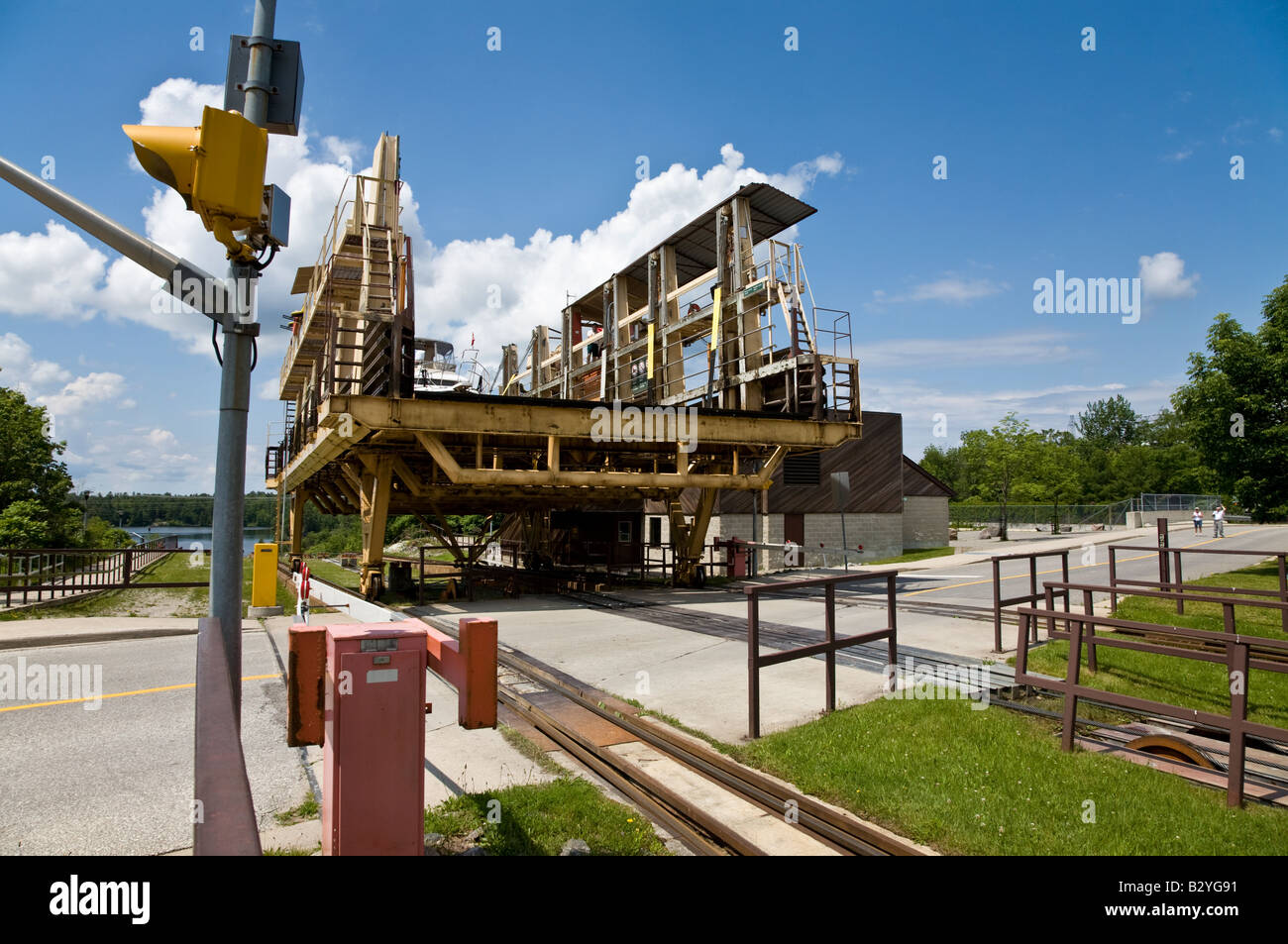 Marine railway boat carriage crosses the highway at Big Chute, Ontario ...