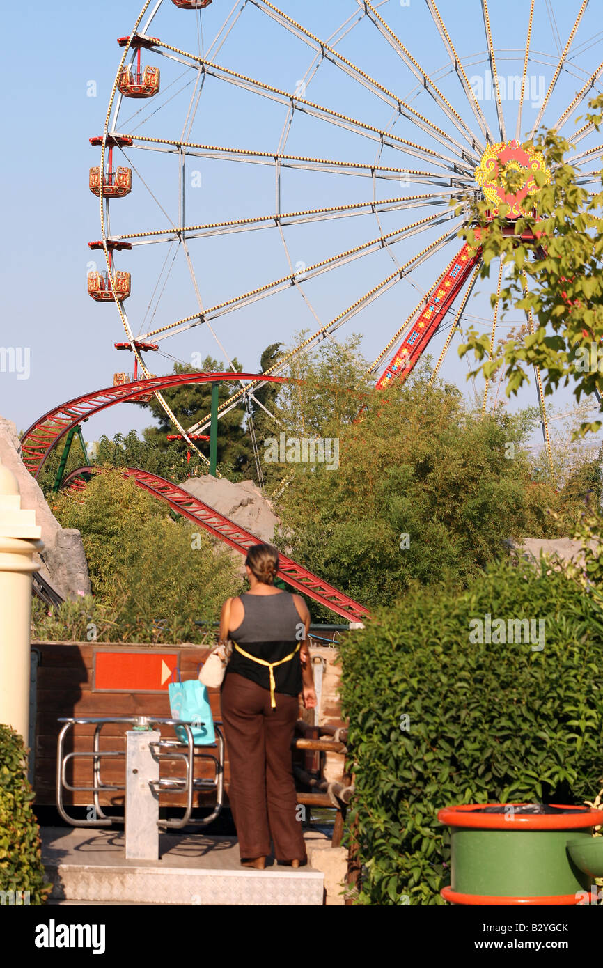 view from amusement park roller coaster and plants Stock Photo - Alamy