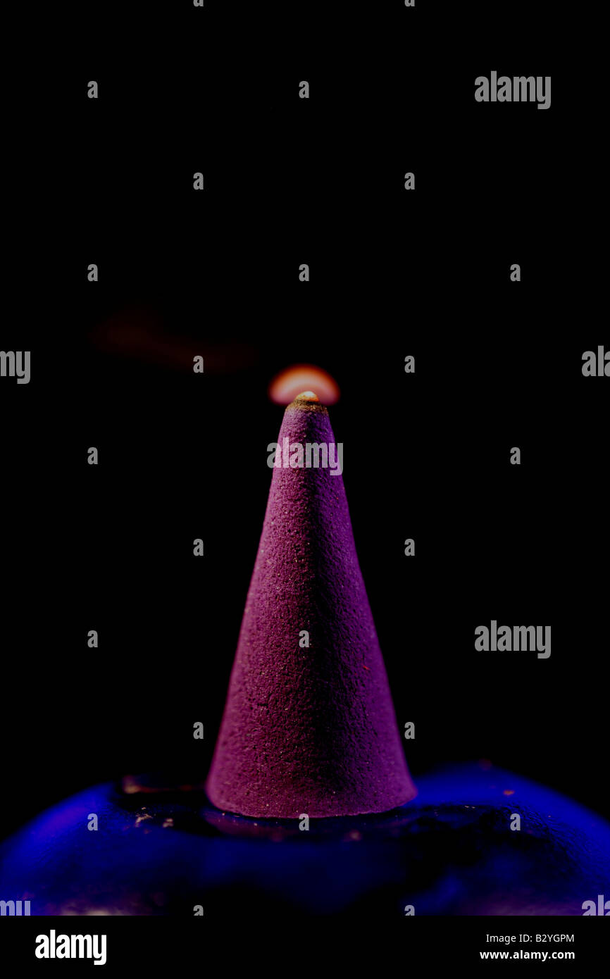 purple incense burning Stock Photo - Alamy