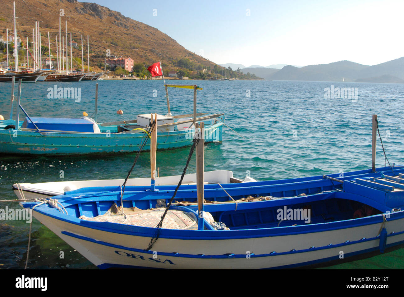 Turkish fishing boat in harbor, Bozburn, Datca Peninsula, Turkey Stock ...